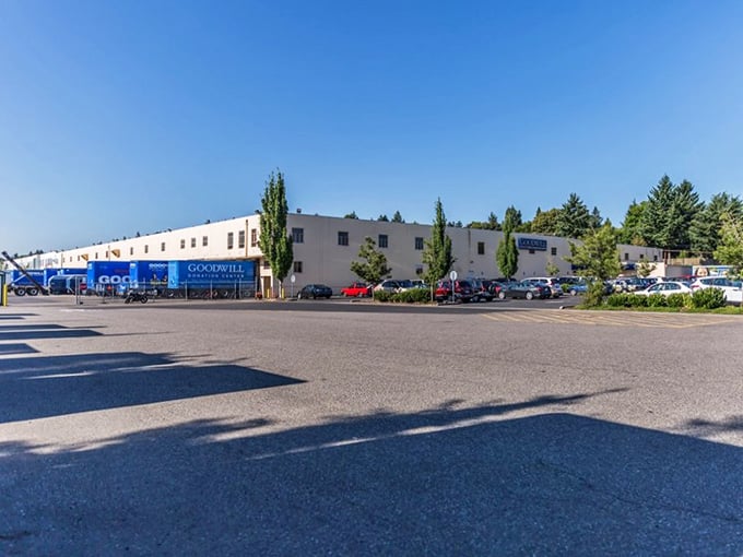 The unassuming exterior hides a treasure hunter's paradise within. Like finding a secret level in a video game, but with vintage sweaters instead of power-ups.