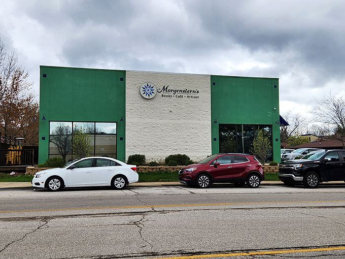 The distinctive green and white exterior of Morgenstern's stands like a beacon for book lovers, promising literary treasures within its welcoming walls.
