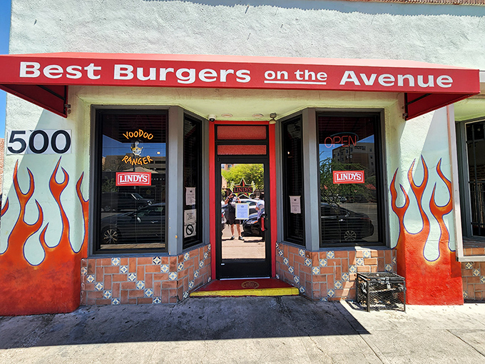 Flame-painted walls and a bold red awning announce Lindy's mission without subtlety: these are indeed the "Best Burgers on the Avenue." No false advertising here.