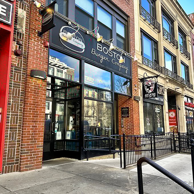 The brick-front gateway to burger paradise, where locals line up for towering creations that require both strategy and napkins.