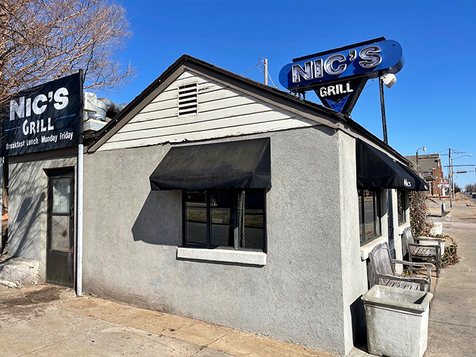 The unassuming exterior of Nic's Grill looks like any other house on the block&mdash;until you spot that sign promising burger nirvana inside.
