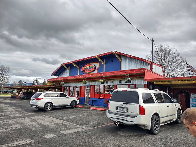 The vibrant red, blue, and yellow exterior of Wally's isn't just eye-catching&mdash;it's a time portal to when drive-ins ruled the American landscape. 