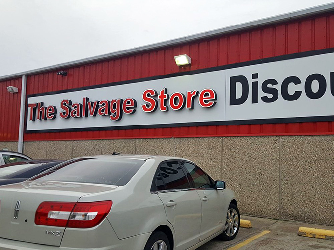 The bright red exterior of The Salvage Store stands out like a beacon for bargain hunters, promising treasure inside those unassuming walls.