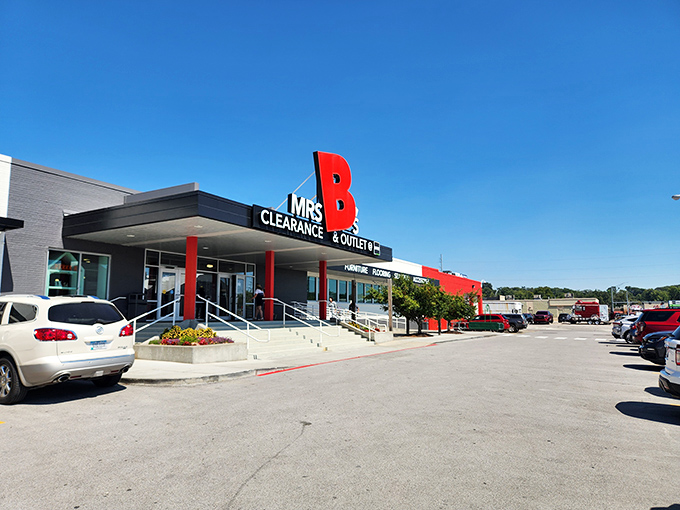 The iconic red and green sign of Mrs. B's stands like a beacon of hope for bargain hunters across Nebraska.