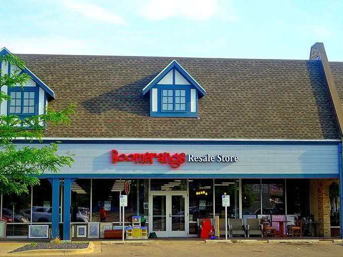 The Tudor-style exterior of Boomerangs beckons with its distinctive blue trim and red signage—a portal to bargain-hunting adventures within.