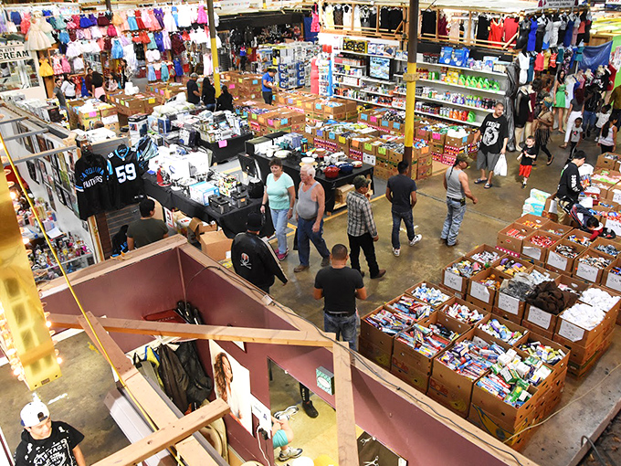 Step right up to the carnival of commerce! This flea market aisle is a kaleidoscope of neon signs, cowboy hats, and endless possibilities.
