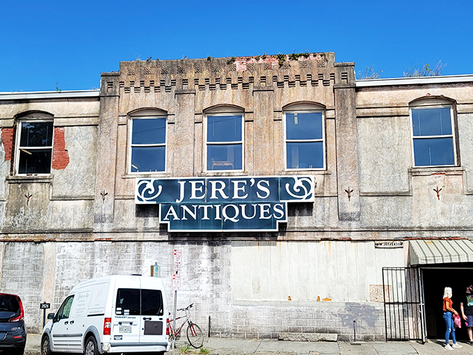 The unassuming castle of wood and wonder. Jere's Antiques' exterior gives little hint of the mahogany motherlode waiting just beyond those doors.