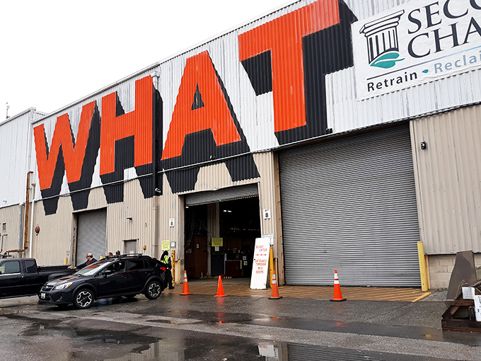 The warehouse with "WHAT" emblazoned across it isn't asking a question&mdash;it's making a statement about possibility and transformation.