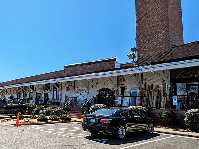 The iconic brick exterior of Gibson Mill stands as a monument to retail resurrection, where yesterday's treasures await tomorrow's homes.