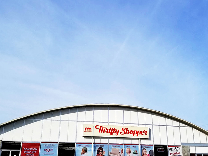 The curved roof of Thrifty Shopper stands like a cathedral of secondhand treasures, promising retail adventures that won't break the bank.
