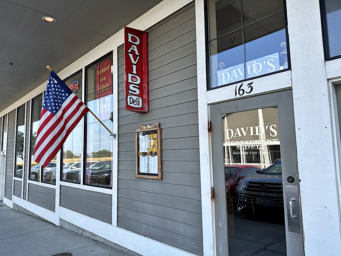 The unassuming storefront that launches a thousand breakfast dreams. American flag proudly waving, as if announcing: "Patriotism and pancakes served here!"