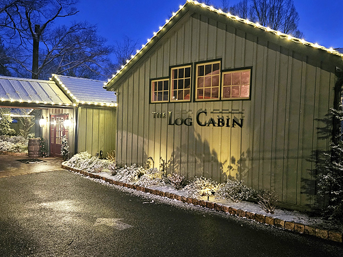 The Log Cabin's exterior glows with warm invitation at twilight, like a beacon of culinary promise in Pennsylvania's countryside.