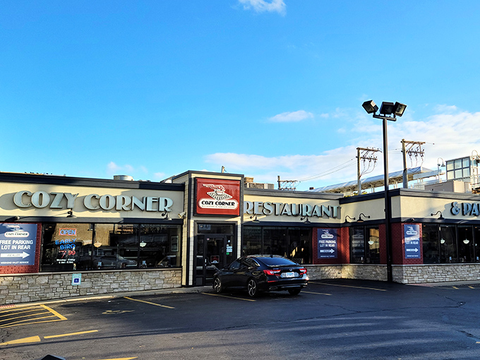 The unassuming storefront of Cozy Corner stands like a beacon of breakfast hope on Milwaukee Avenue, promising pancake salvation to hungry Chicagoans.