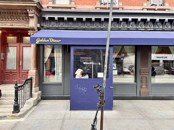 The royal blue awning of Golden Diner stands out like a beacon of breakfast hope on this unassuming Chinatown corner.