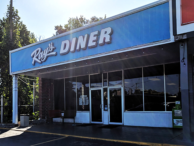 The iconic blue sign of Ray's Diner stands as a beacon of breakfast hope on Two Notch Road in Columbia.