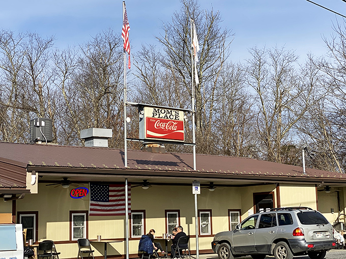 Mom's Place announces itself with no-nonsense charm – colorful signs promising pepperoni rolls, beef BBQ, and other delights that make your stomach growl in anticipation.