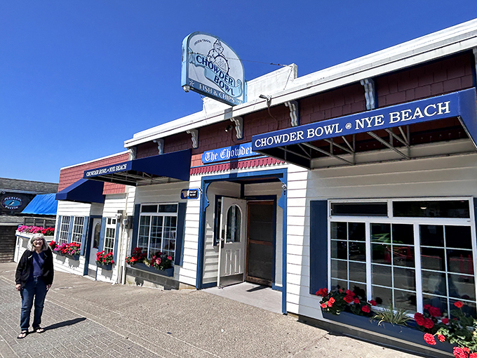 The classic coastal charm of The Chowder Bowl beckons like an old friend, its blue-trimmed facade promising seafood salvation after a long drive.