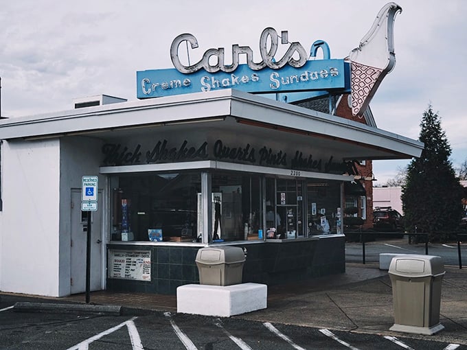 The iconic Art Deco fa&ccedil;ade of Carl's stands like a beacon of frozen delight against the Virginia sky. Some buildings just scream "summer memories inside!"