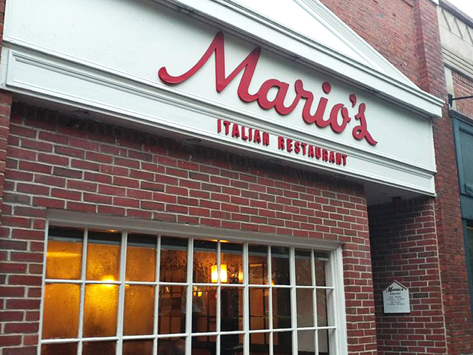 The iconic red script of Mario's against classic brick &ndash; like a neon welcome sign for your stomach that's been guiding hungry Lexingtonians for generations.