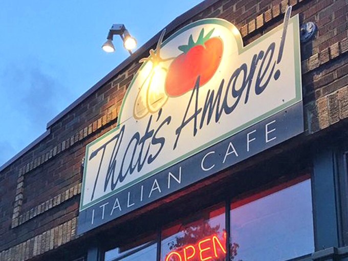 That iconic tomato sign glowing against Seattle's evening sky isn't just a logo&mdash;it's a beacon calling hungry souls home to pasta paradise.