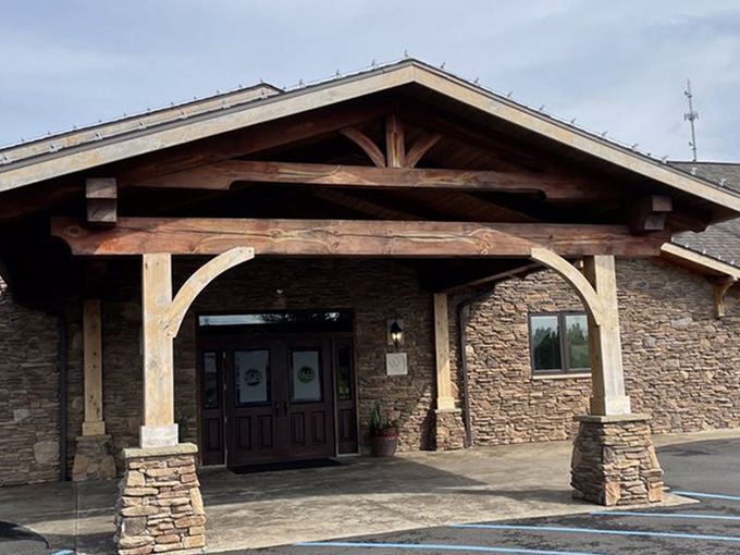 The stone exterior of Wonder Bar stands proudly against West Virginia's blue sky, like a mountain lodge that happens to serve life-changing steaks.