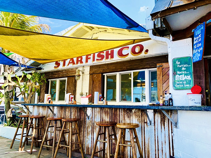 The unassuming entrance to seafood paradise. No fancy awnings or valet parking here&mdash;just the promise of ocean-fresh delights inside.