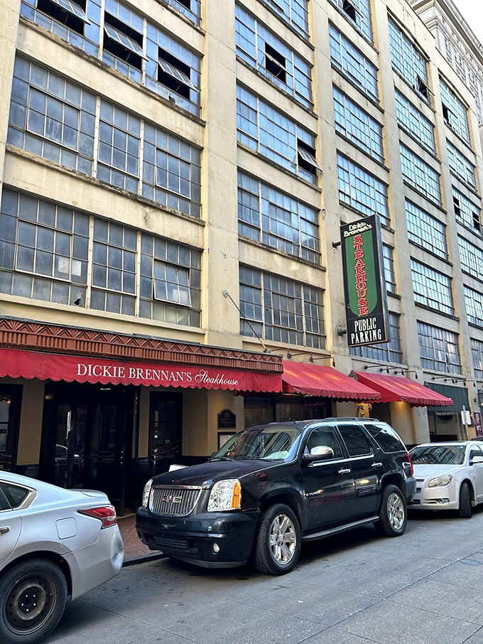 The unassuming red awning of Dickie Brennan's Steakhouse beckons from the historic French Quarter, promising culinary treasures that outshine its modest exterior.