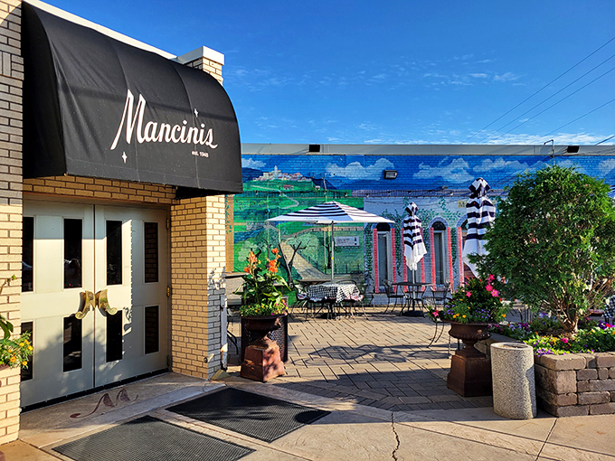 That vintage neon sign isn't just advertising &ndash; it's a time machine promising cocktails, steaks, and an evening where calories don't count.