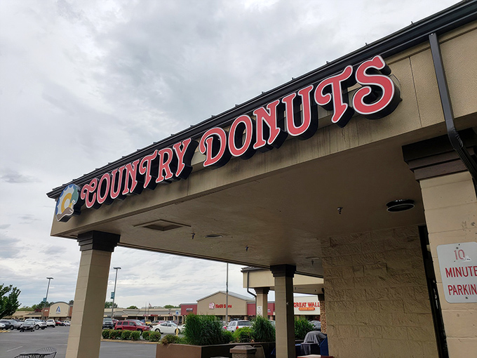 The unassuming storefront promises nothing fancy&mdash;just the sacred covenant of exceptional donuts waiting inside. Simple, straightforward, perfect.