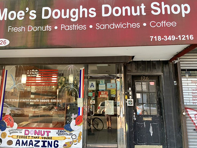 The unassuming burgundy awning of Moe's Doughs stands as Brooklyn's sweetest secret hiding in plain sight, complete with vintage charm and bicycles parked hopefully nearby.