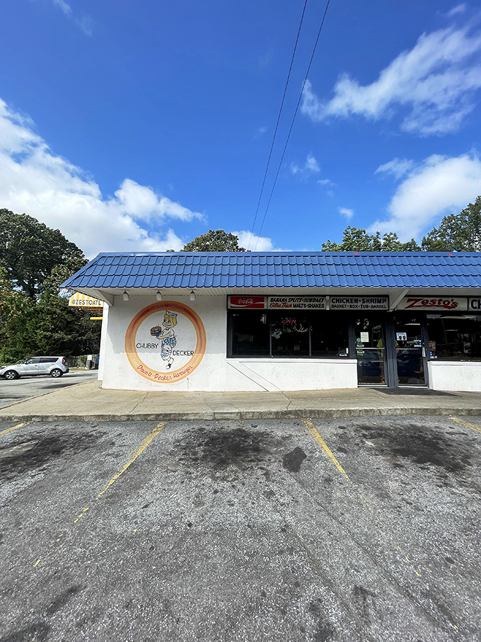 The distinctive blue roof and vintage cartoon chicken beckon like old friends. Zesto's East Atlanta location has the comforting permanence of a neighborhood landmark.