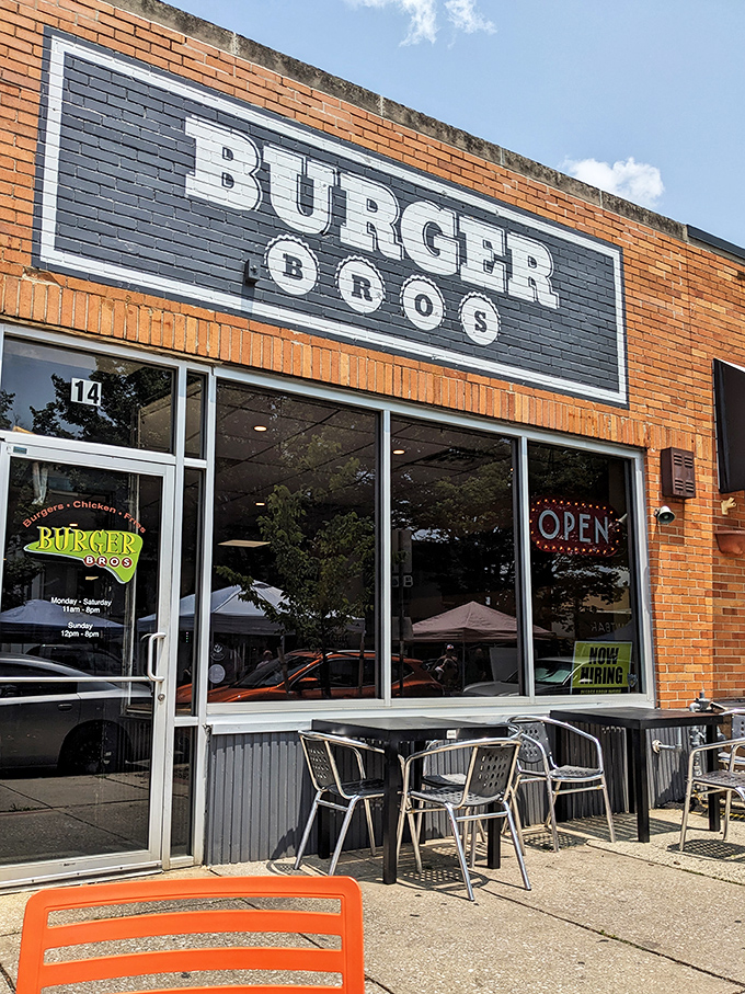 The Burger Bros sign against brick is like a beacon for burger pilgrims&mdash;promising salvation in sandwich form for the hungry and hopeful.