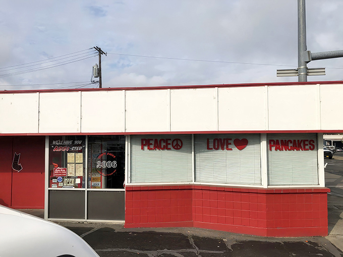 The classic red and white exterior promises what every great American diner should: Peace, Love, and Pancakes. A holy trinity if there ever was one. 