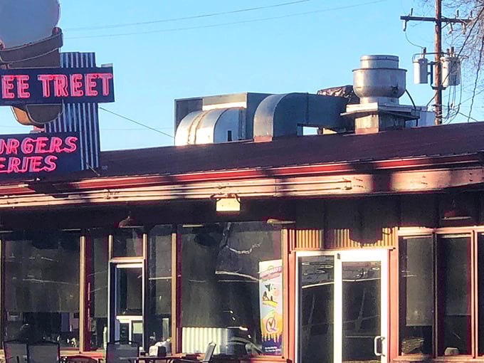 The iconic Tastee Treet sign stands as a beacon of hope for hungry travelers, promising burgers and fries that transcend fast food into the realm of culinary memory-making. 