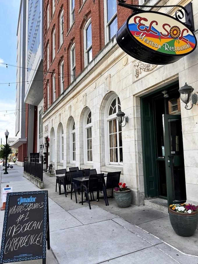El Sol's modest storefront belies the culinary treasures within. Those string lights aren't just decoration&mdash;they're beacons guiding hungry souls to enchilada nirvana.