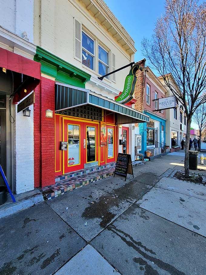 The modest red storefront screams "culinary destination," waving you in for a fiesta of flavors.