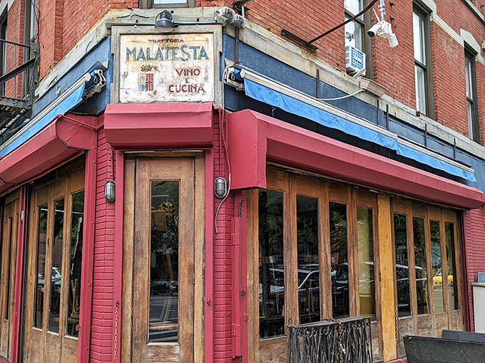 The corner charm of Malatesta beckons with its red awning and sidewalk seating&mdash;a little slice of Italy on Washington Street where conversations flow as freely as the wine.