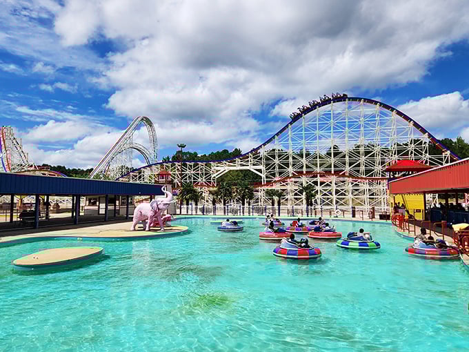 Where roller coasters and water attractions collide! The ArieForce One's dramatic white structure provides the perfect backdrop for colorful bumper boats on a hot Georgia day.
