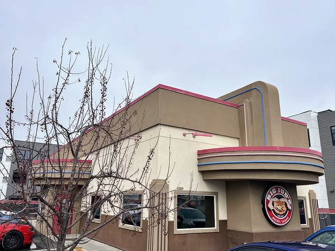 Big Jud's Art Deco-inspired exterior stands like a time machine to burger paradise, complete with that iconic pink trim that says "serious comfort food inside."