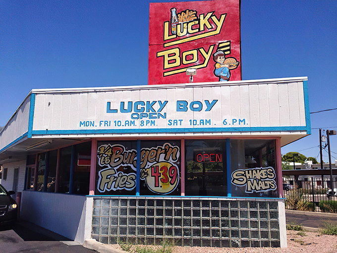 The bright red Lucky Boy sign against the Arizona sky isn't just signage &ndash; it's a beacon of burger bliss that's been guiding hungry Phoenicians home since Eisenhower was in office. 