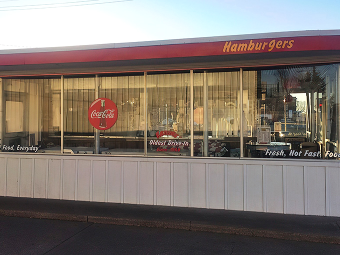 The iconic white building with red trim has been a Hutchinson landmark since 1948. The "Green River" sign promises nostalgic delights within.