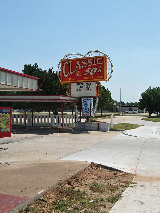 That iconic neon sign isn't just advertising &ndash; it's a time machine promising juicy burgers and nostalgia served in equal portions.