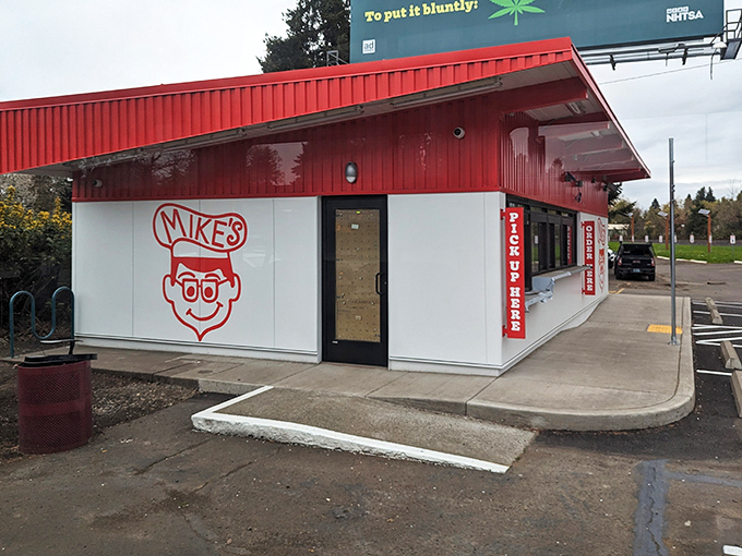 The iconic red exterior of Mike's Drive-In stands as a beacon of burger bliss in Milwaukie, promising nostalgic flavors that never go out of style.
