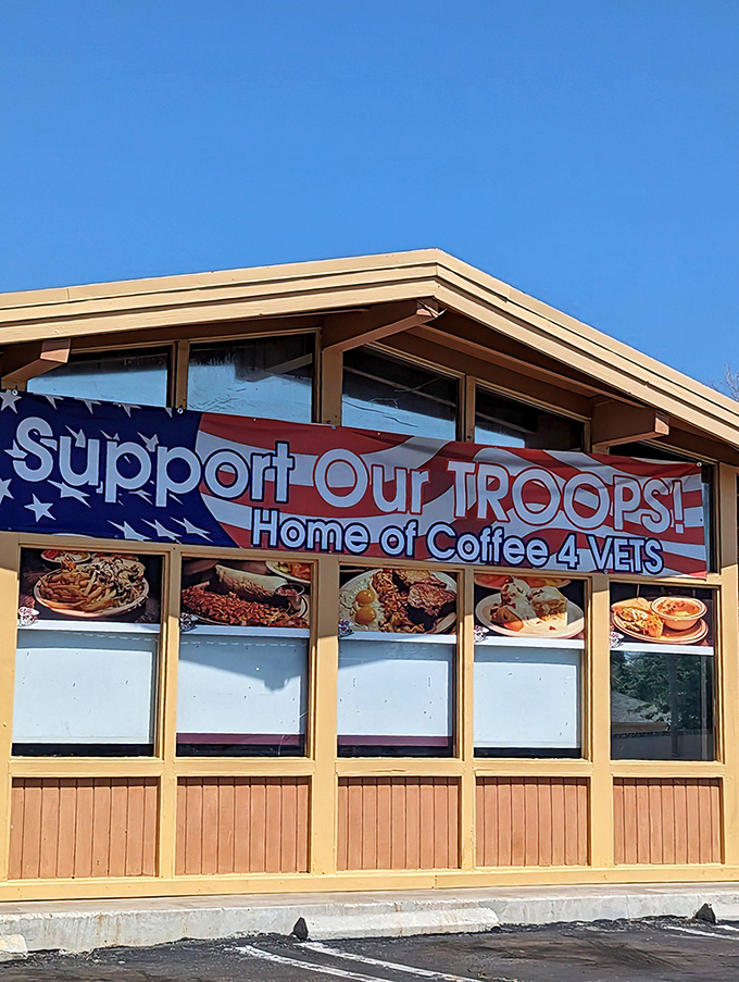 Patriotism meets pancakes at Crazy Otto's exterior. The "We Support Our TROOPS" banner reminds us that good diners are community cornerstones.