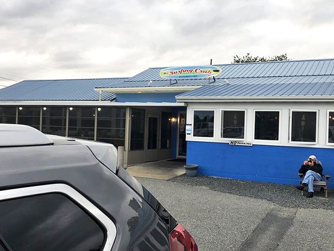 The blue facade of The Surfing Crab stands like a seaside sanctuary calling to hungry souls and promising delicious ocean treasures within.