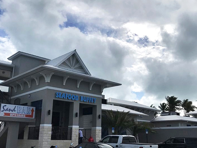 A gleaming white sanctuary of seafood awaits at Whale Harbor, standing like a maritime palace against the Florida Keys sky.