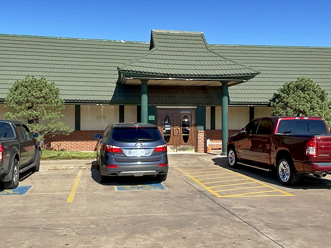 The unassuming green-roofed exterior of Golden Palace might not stop traffic, but locals know this modest facade hides a treasure trove of deliciousness inside.