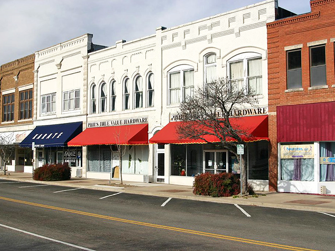 Downtown Bartlesville's historic brick buildings stand like sentinels of a bygone era, where oil money met prairie ambition.