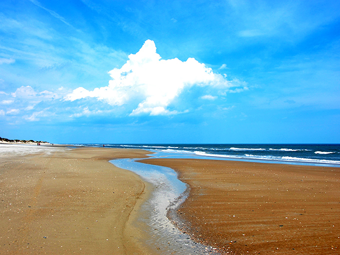 Miles of untouched shoreline stretch before you, where tire tracks in the sand are the closest thing to rush hour traffic you'll find.