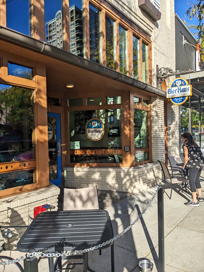 The blue door beckons like a portal to Bavaria, right in downtown Coeur d'Alene. Those red geraniums aren't just for show—they're practically shouting "Willkommen!"